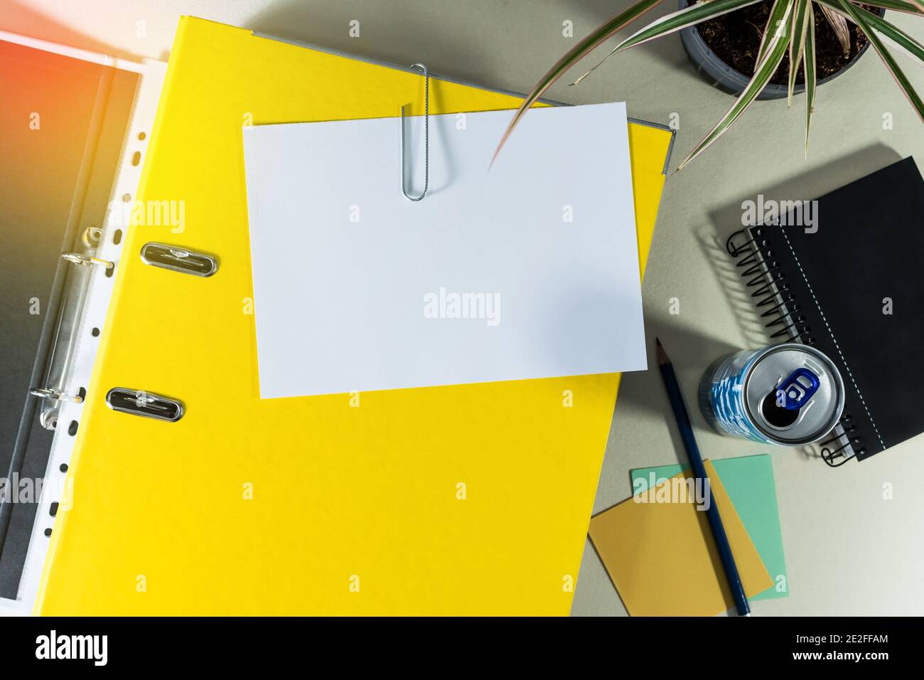 Top view of office folder with copy space and other office supplies on ...