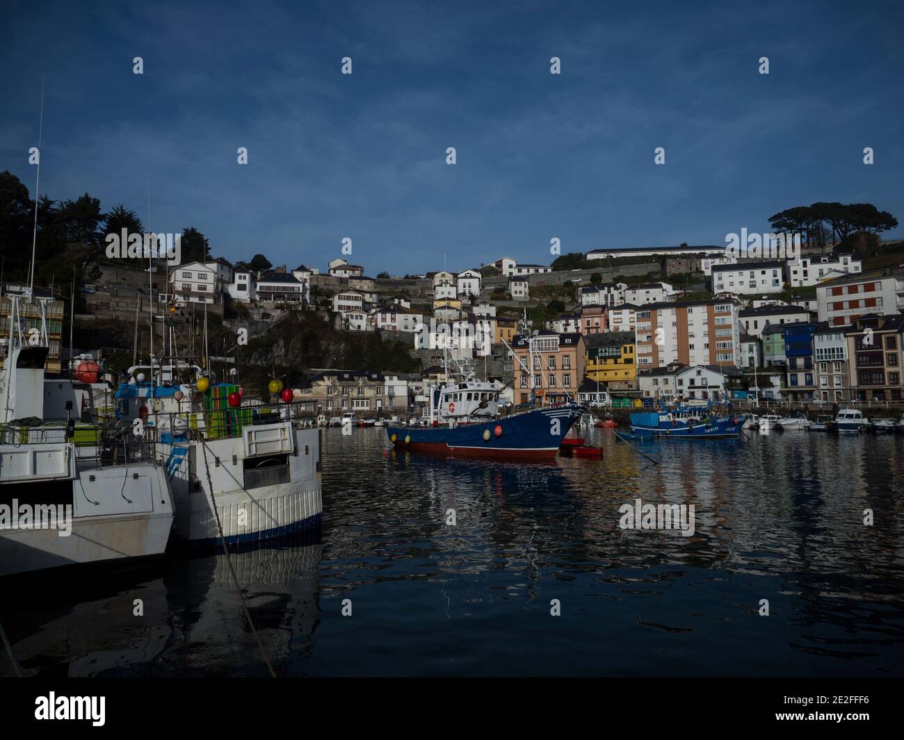 Panorama view of Lluarca Luarca fishing town village harbour port boats ...