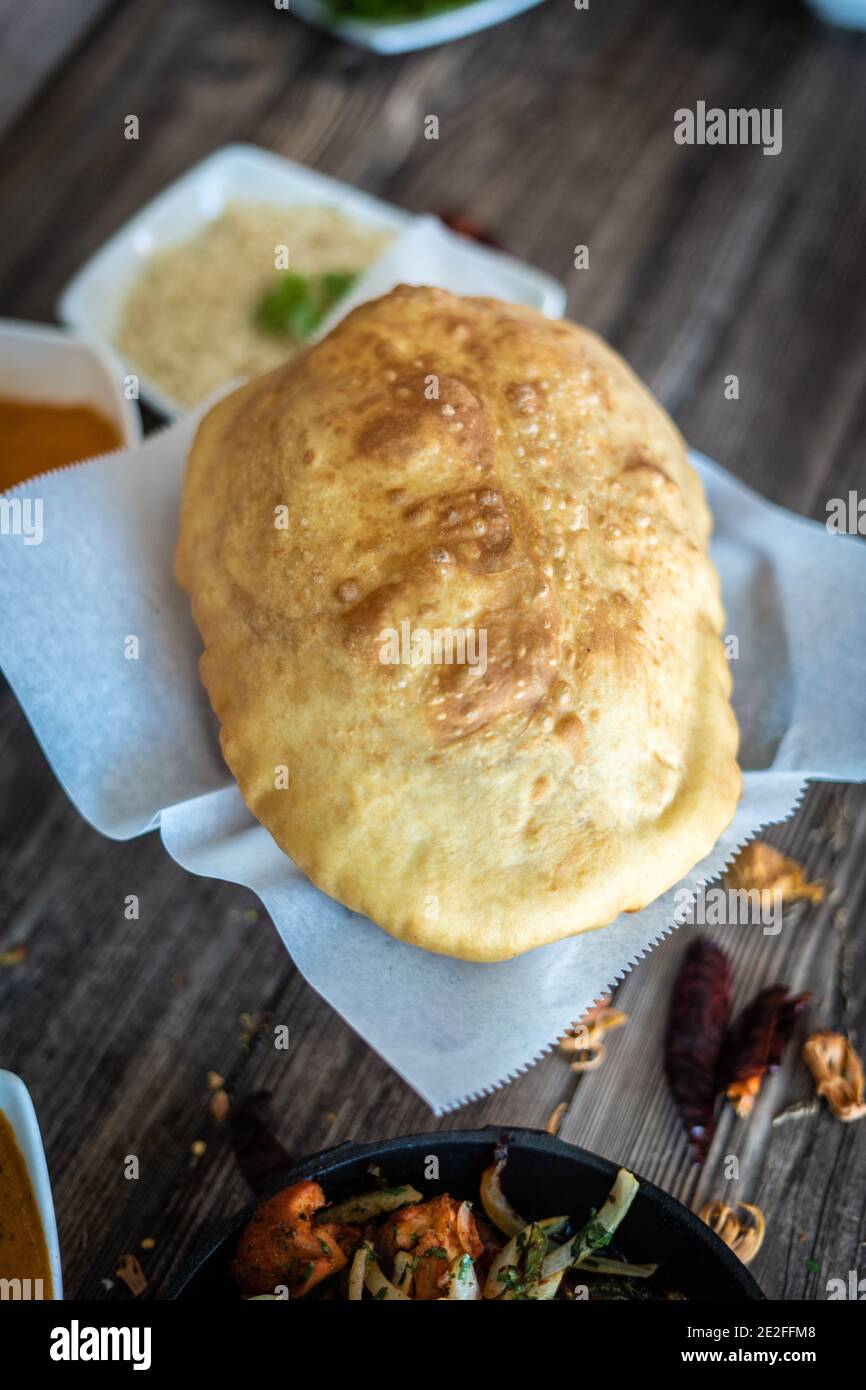 Hot baked poori bread indian cuisine Stock Photo - Alamy
