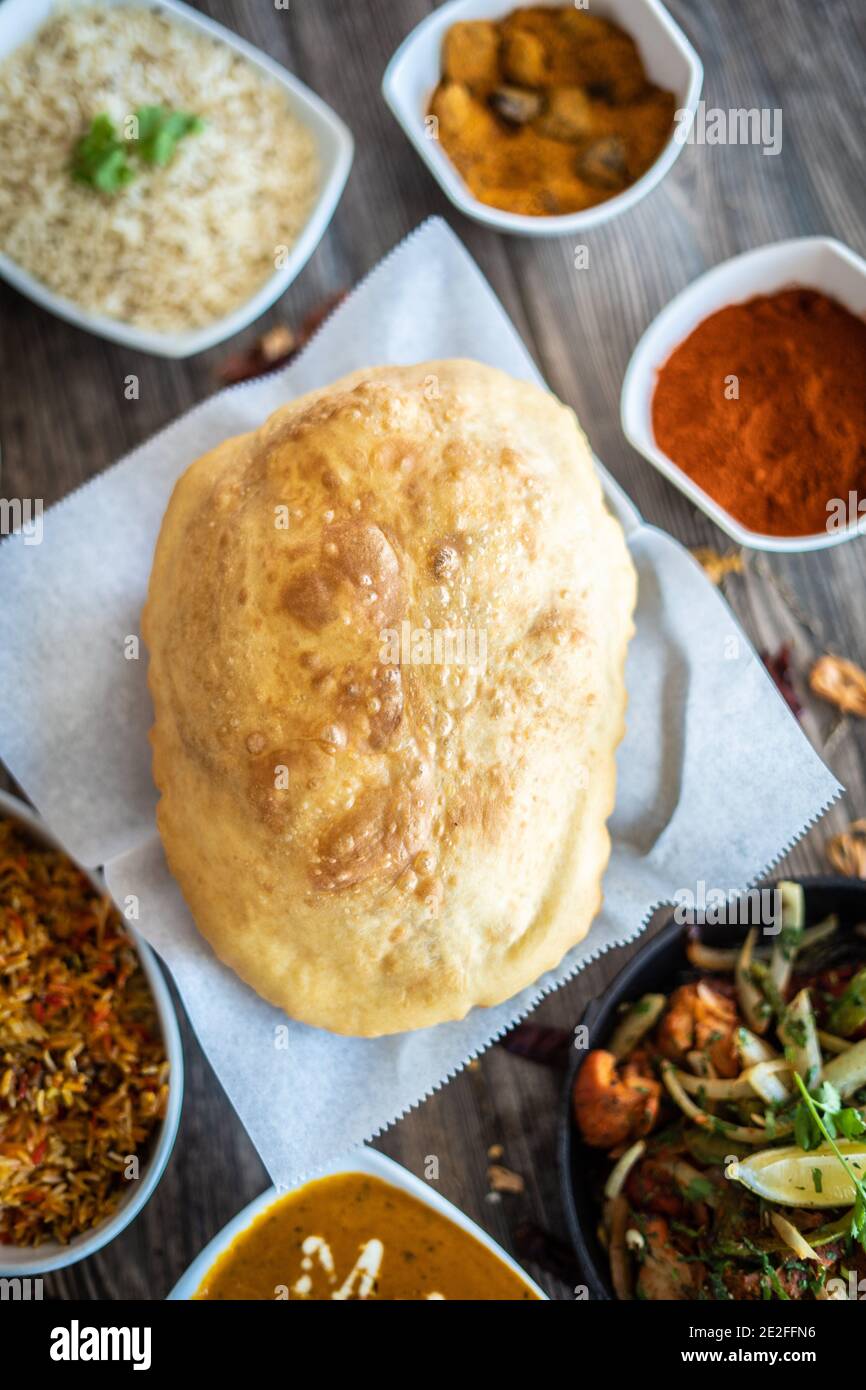 Hot baked poori bread indian cuisine Stock Photo - Alamy