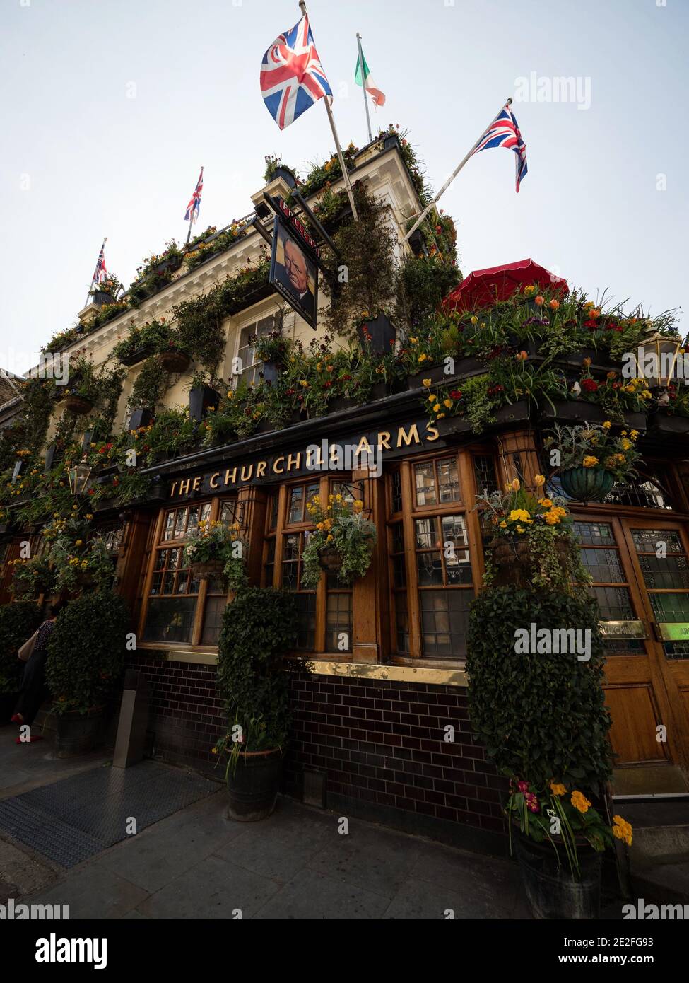 Panorama of colorful pub flower plants The Churchill Arms in Notting ...