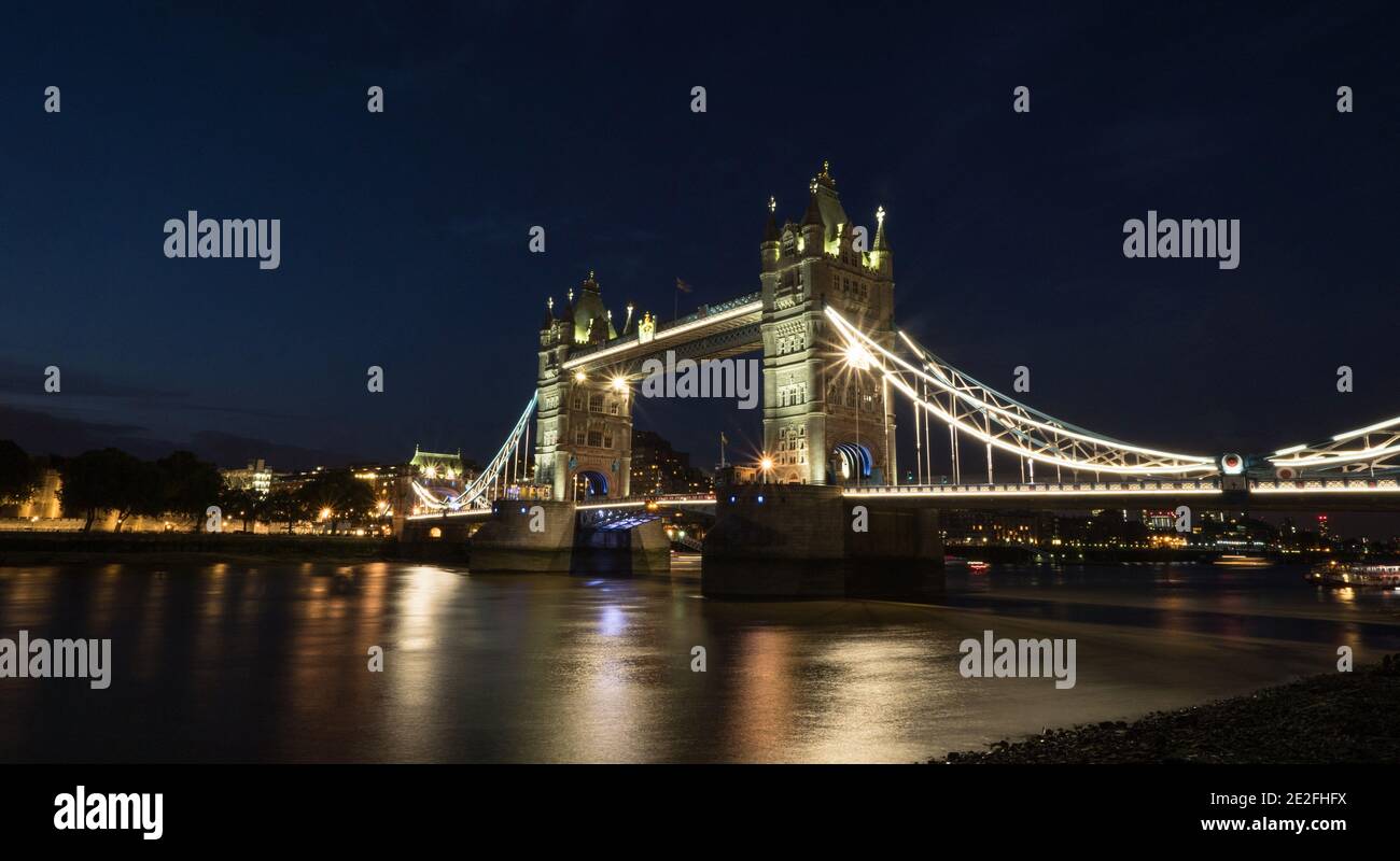 Panorama view of iconic landmark famous illuminated Tower Bridge over ...