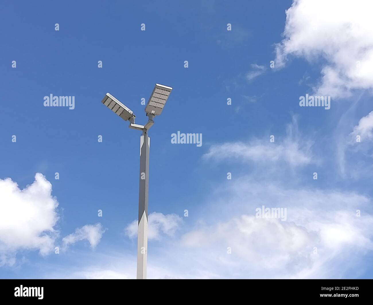 Solar cell pole isolated with blue sky Stock Photo - Alamy