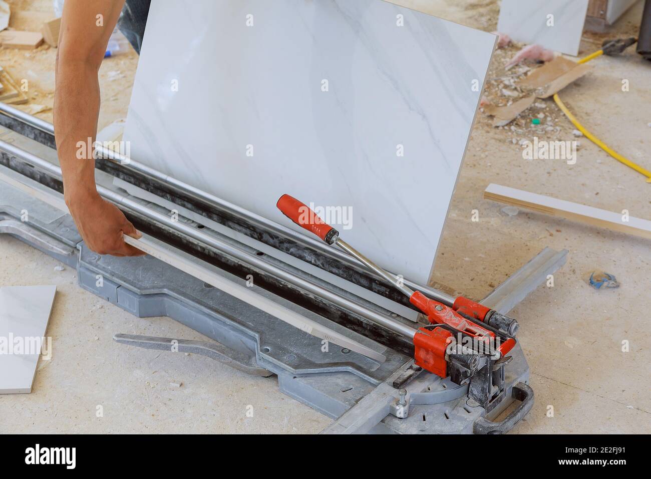Professional tiler cutting tile angle hi-res stock photography and ...