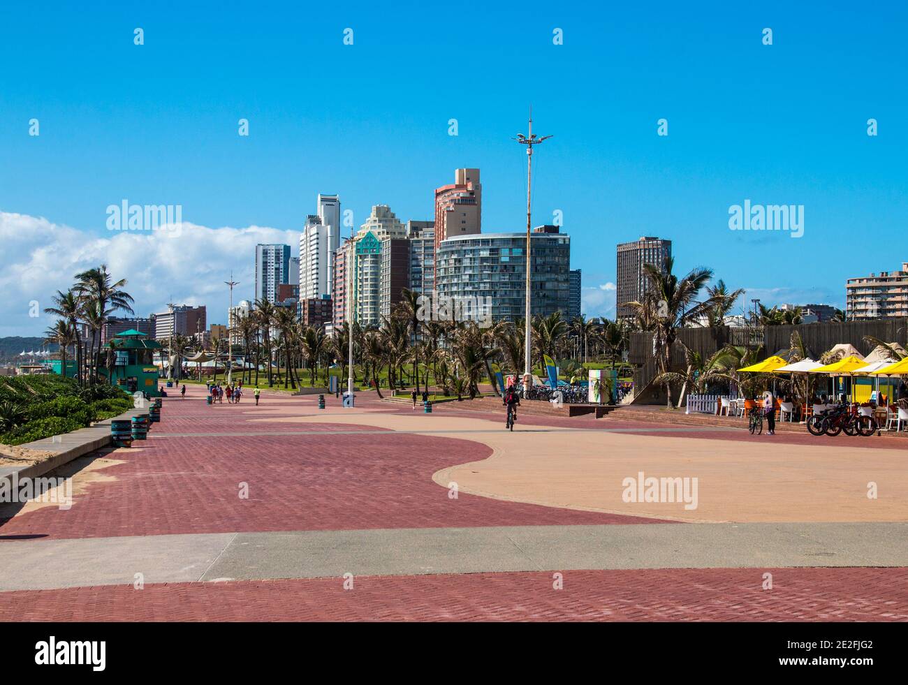 Paved walkway lined with hotels at durban beachfront, south africa ...
