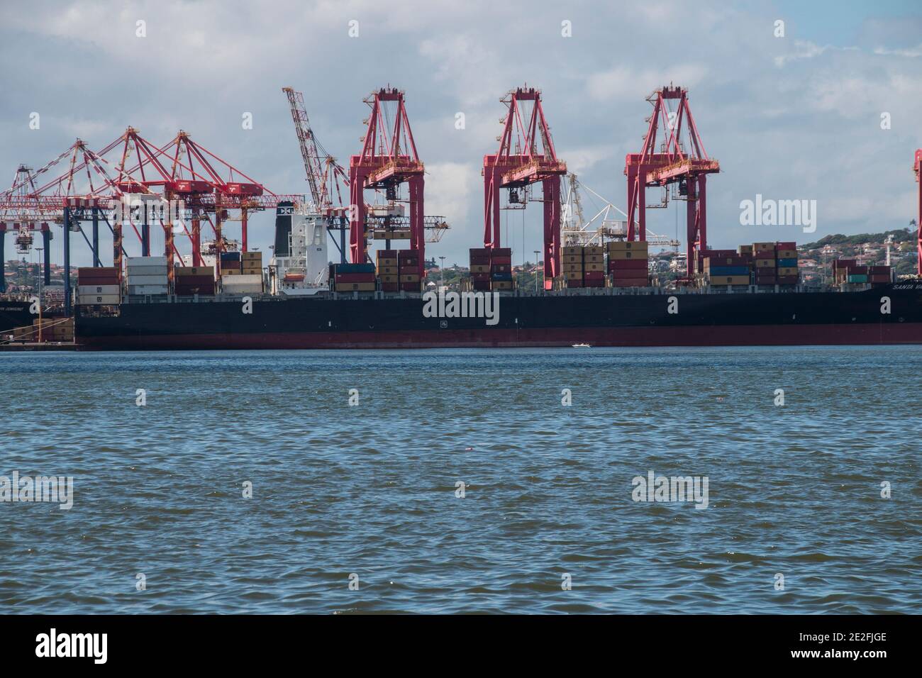 Loading goods onto boat hi-res stock photography and images - Alamy