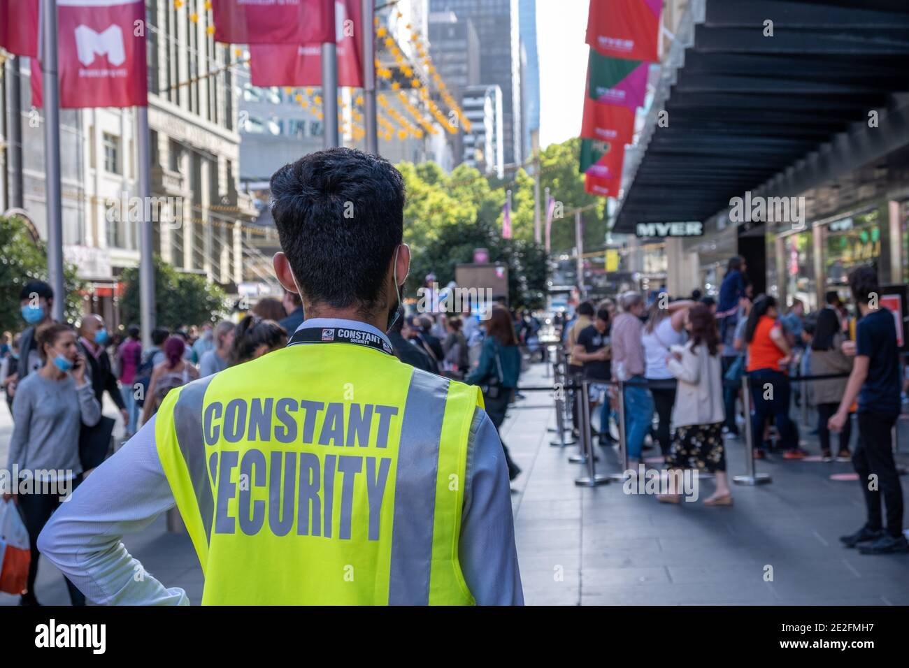 Melbourne, Australia - Circa December, 2020: Security guard watches the ...