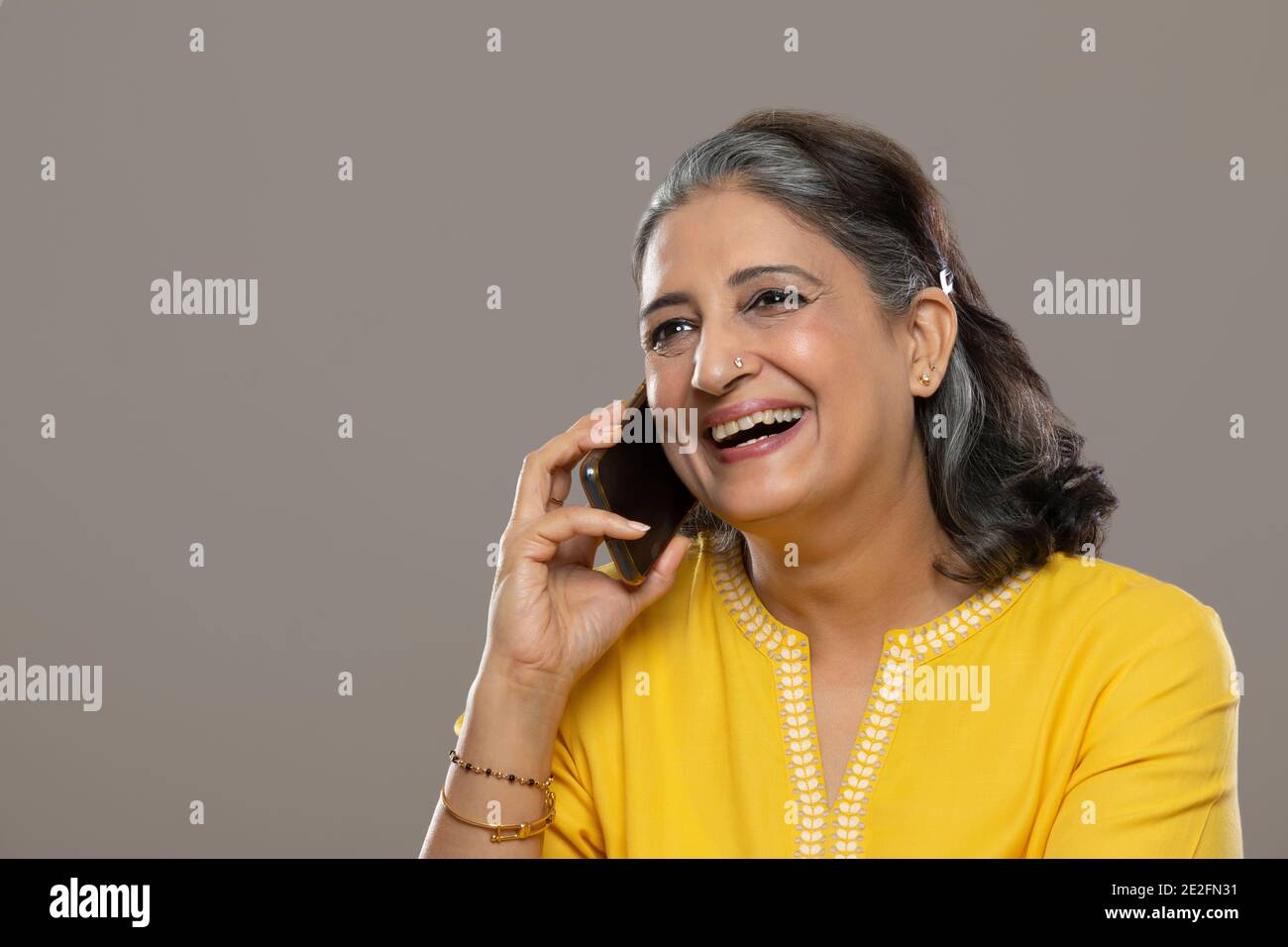 Confident woman smiling happily hi-res stock photography and images - Alamy