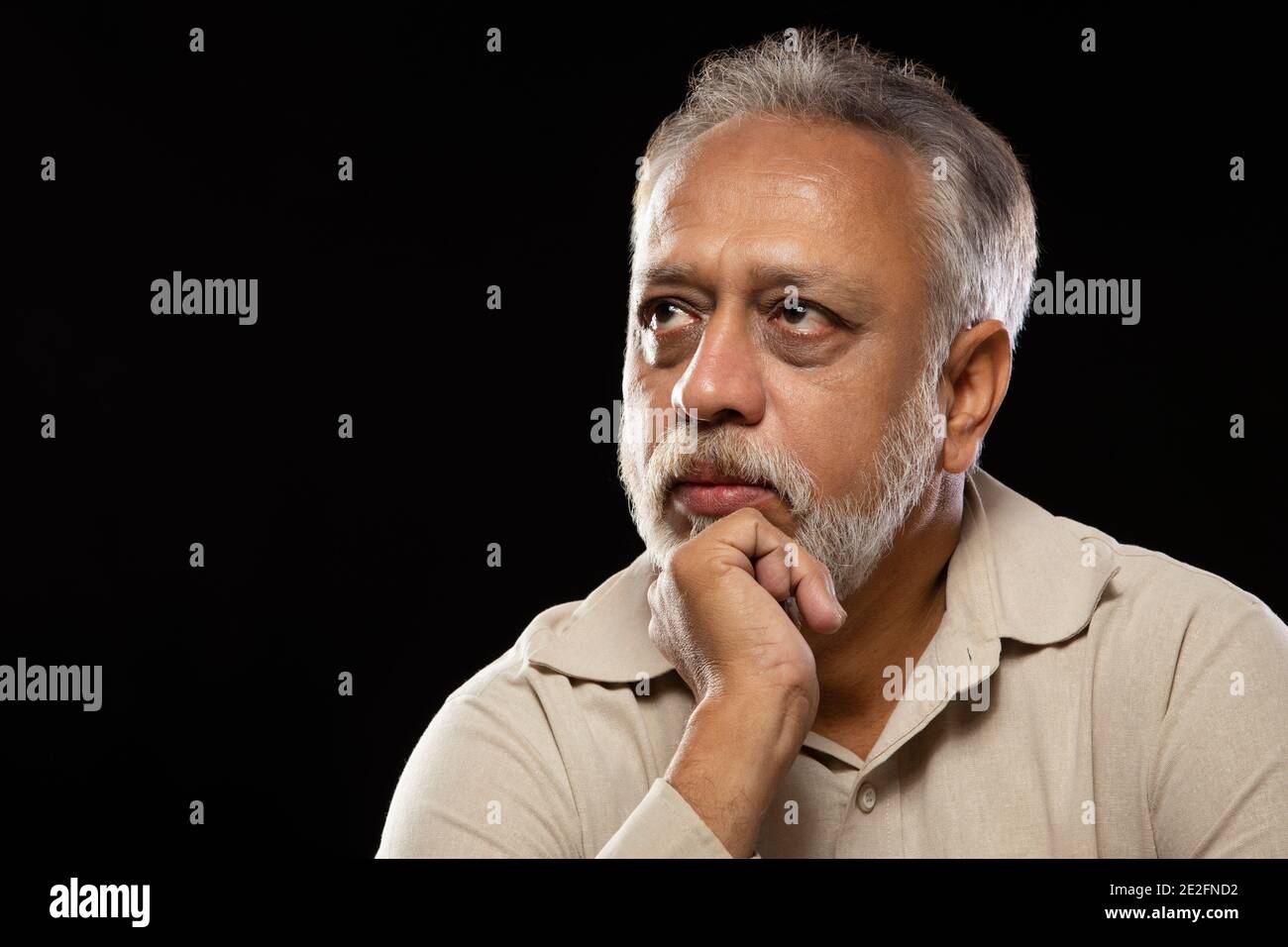 Portrait indian old man thinking hi-res stock photography and images ...