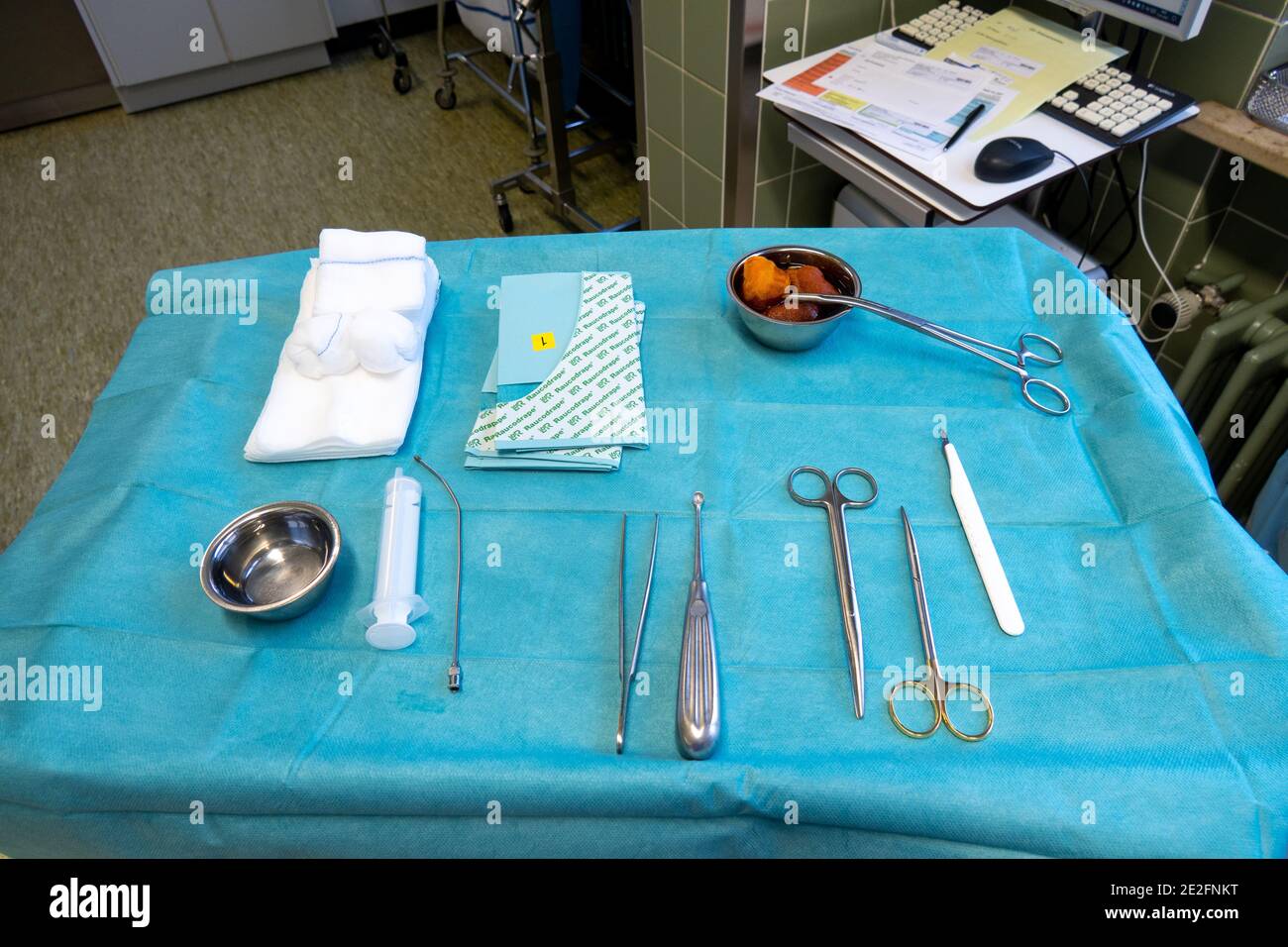 on the operating table are the instruments for performing a minor ...