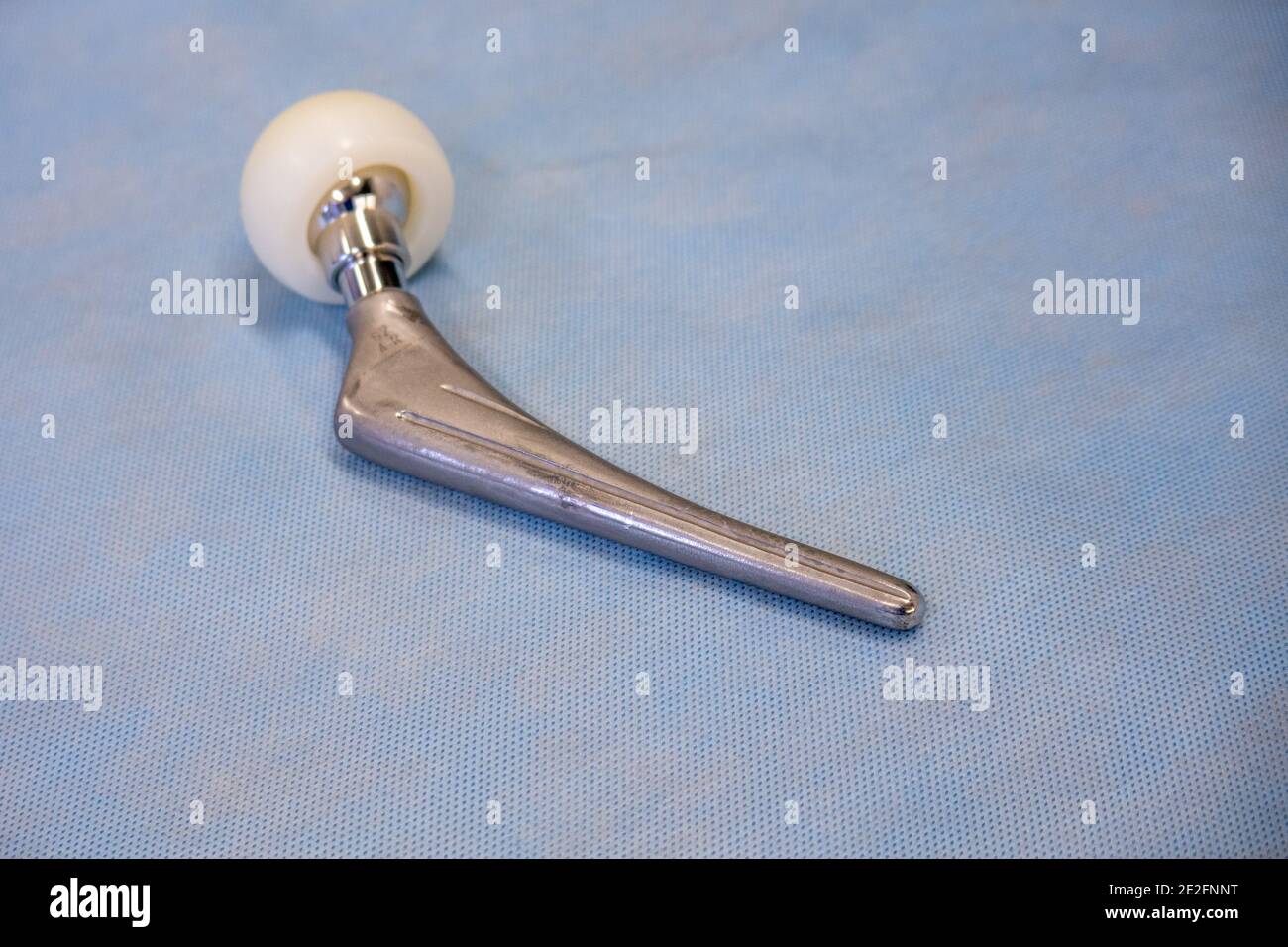 explanted surgical hip prosthesis lies on an operating table Stock ...