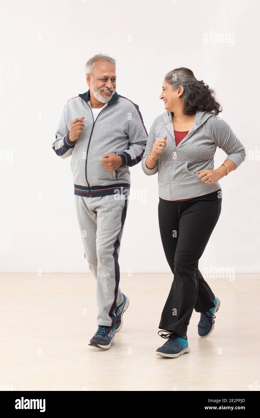 Indian couple jogging hi-res stock photography and images - Alamy
