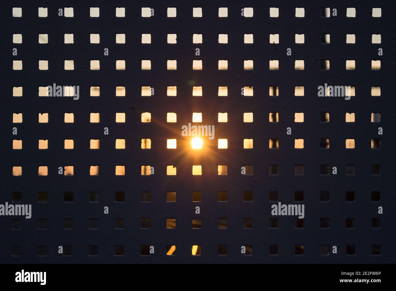 Geometric background with squares. Black metal lattice with backlight ...