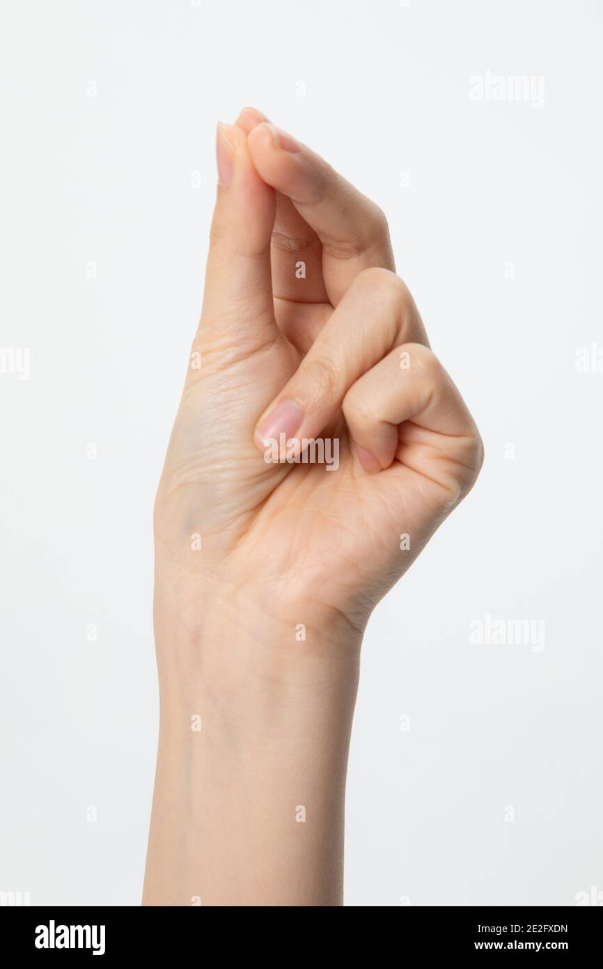 Vertical shot of a hand snapping isolated on a white background Stock ...