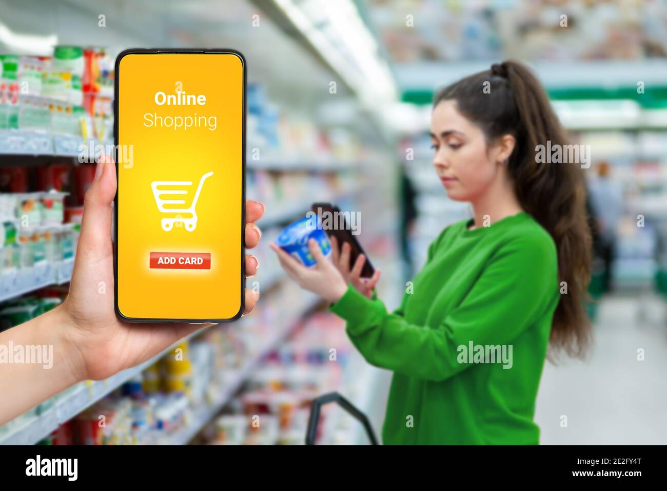 Woman checking label in grocery store hi-res stock photography and ...