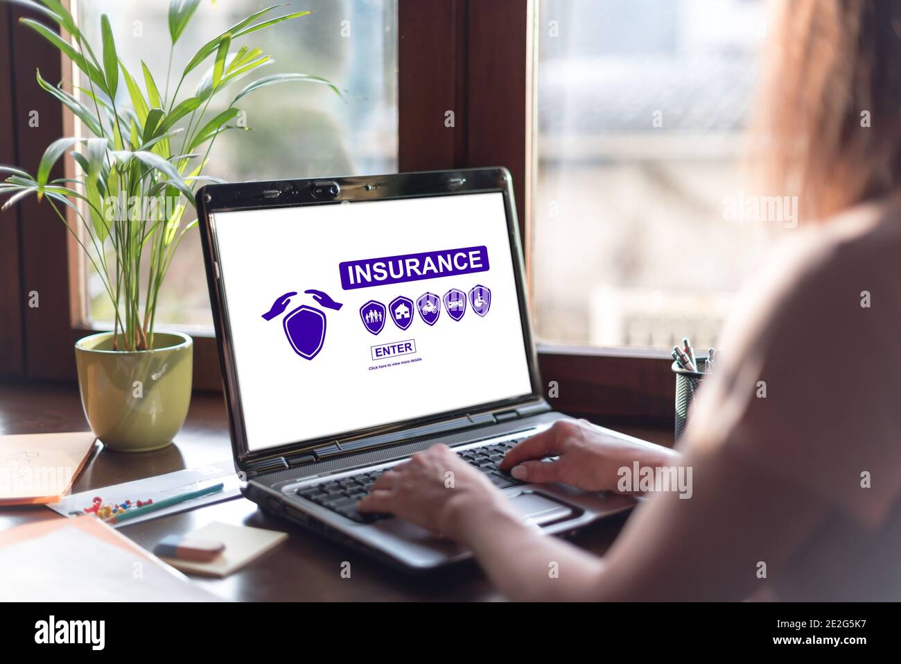 Laptop screen displaying an insurance concept Stock Photo - Alamy