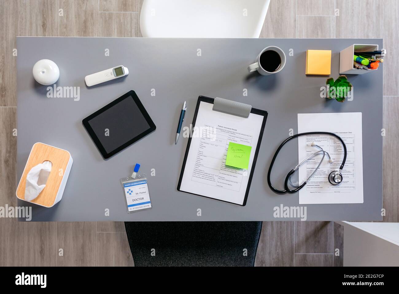 Doctor desk with documents and stethoscope Stock Photo - Alamy