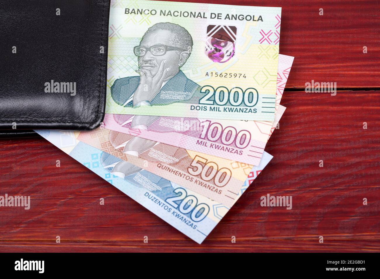 Angolan money - Kwanza a new series of banknotes in the black wallet ...