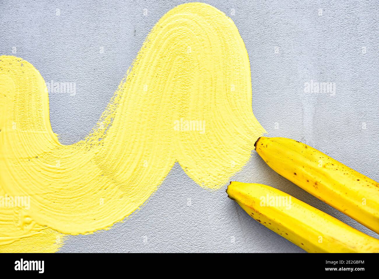 banana paint instead of brush yellow drawing Stock Photo - Alamy