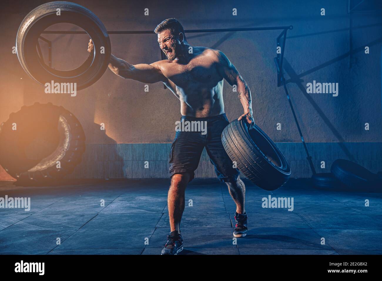 Bodybuilding training, bearded strong sportsman with muscular body ...