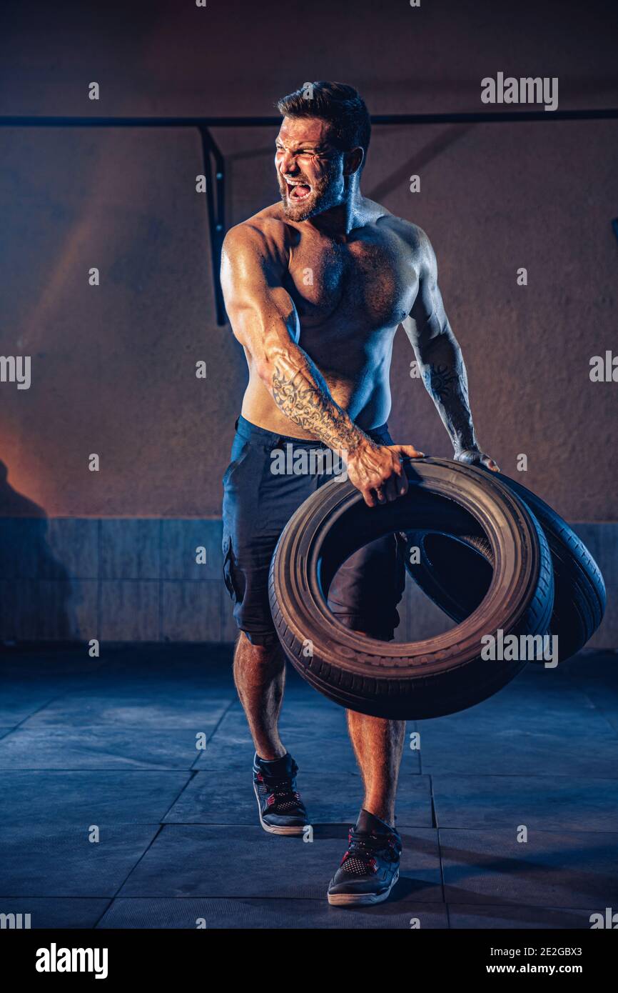 Bodybuilding training, bearded strong sportsman with muscular body ...