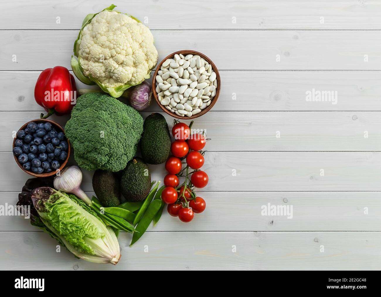 Healthy food background, trendy plant based diet products - fresh raw ...