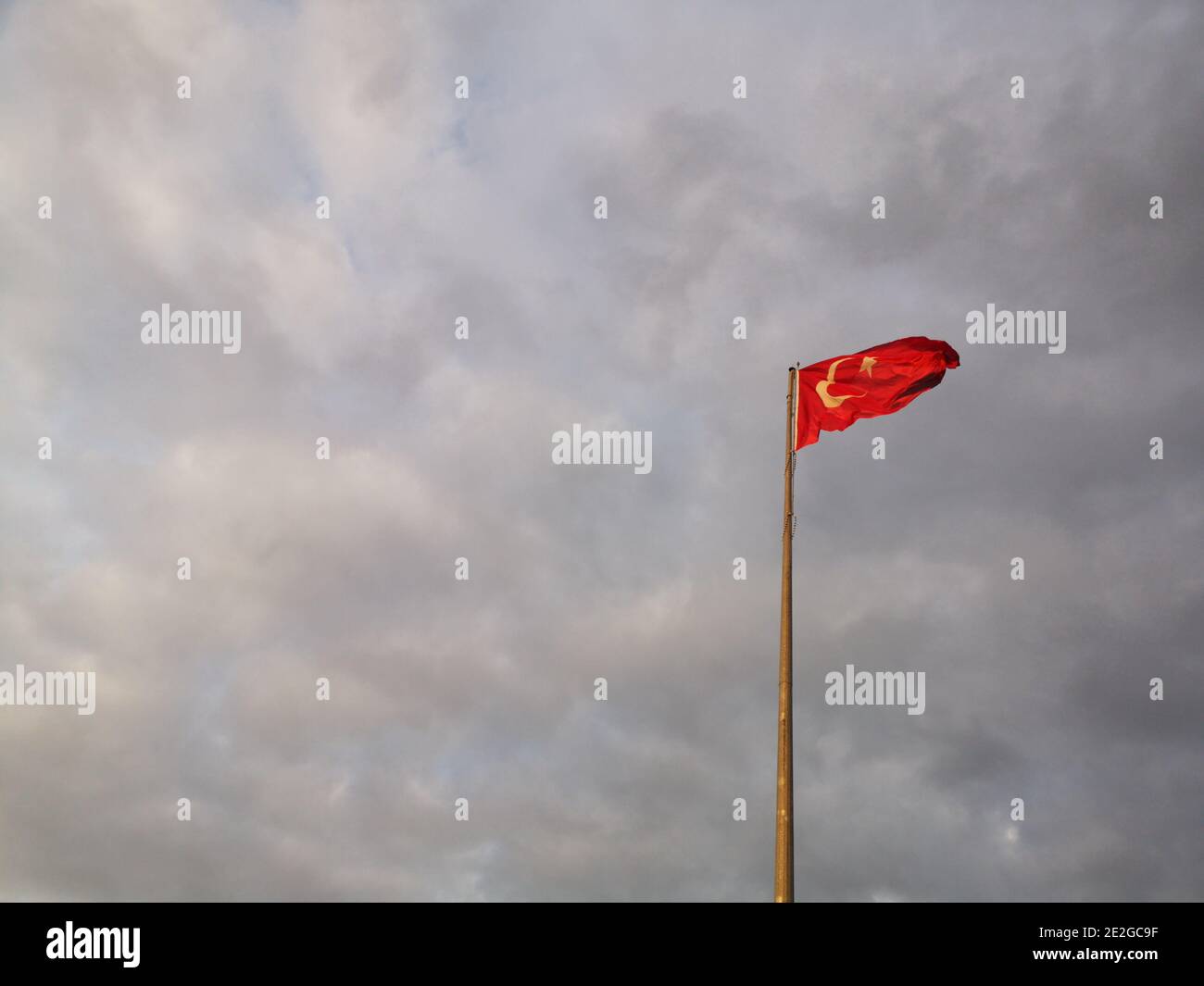Turkey flag on the flagpole waving in the wind against clouds sky Stock ...