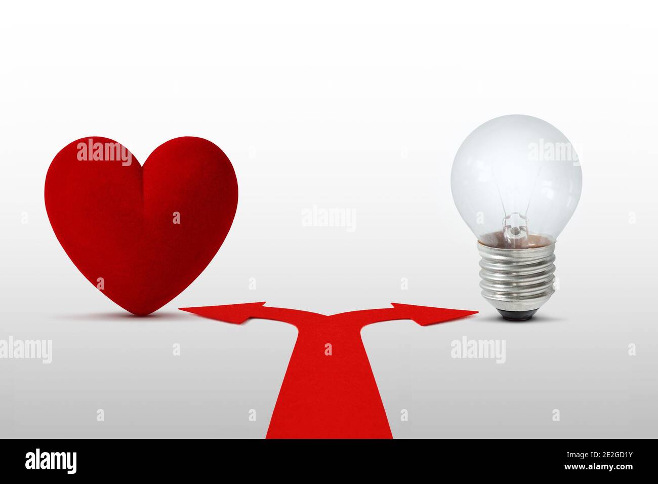 Two way arrows with heart and light bulb - Concept of choice between ...