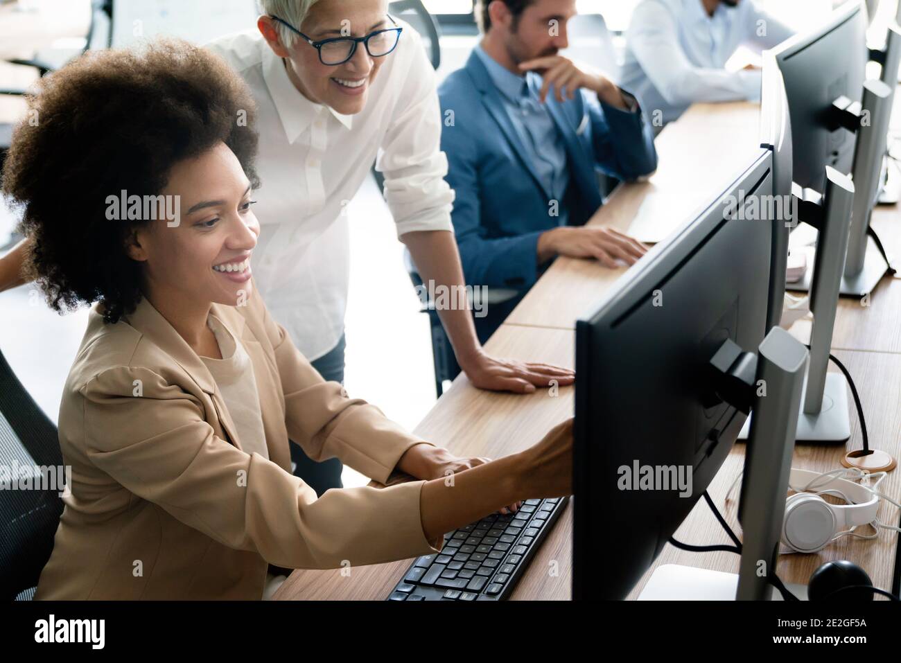 Programmer working in a software developing company Stock Photo - Alamy