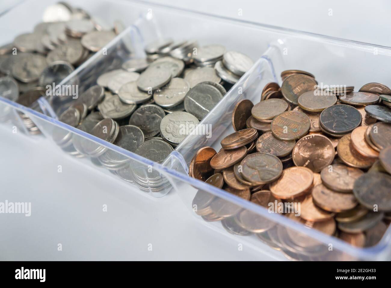 Coins in containers hi-res stock photography and images - Alamy