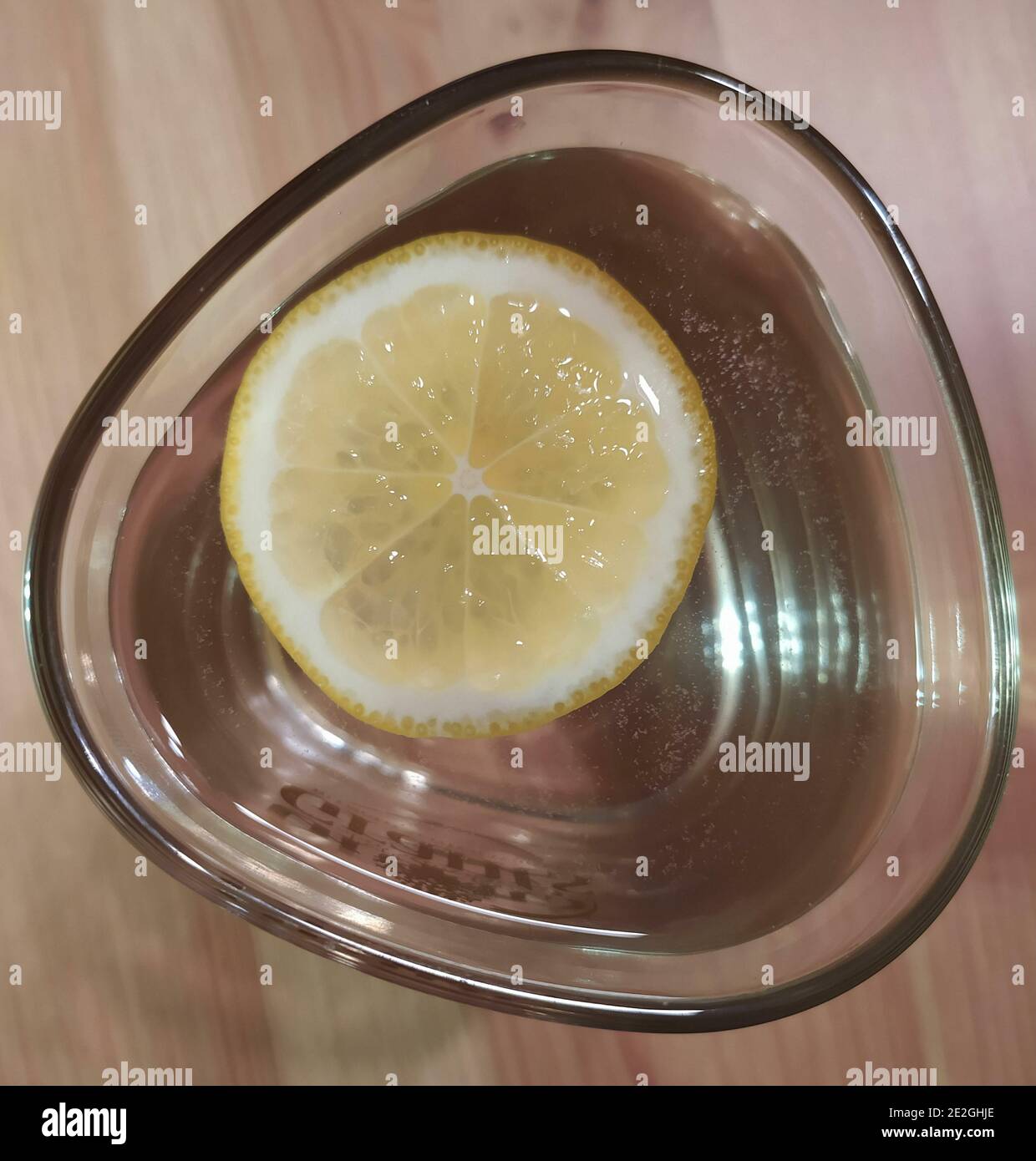 Glass of water with lemon Stock Photo - Alamy
