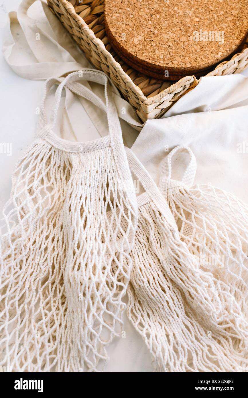 Eco cotton and net shopping bag on white background. High quality photo ...