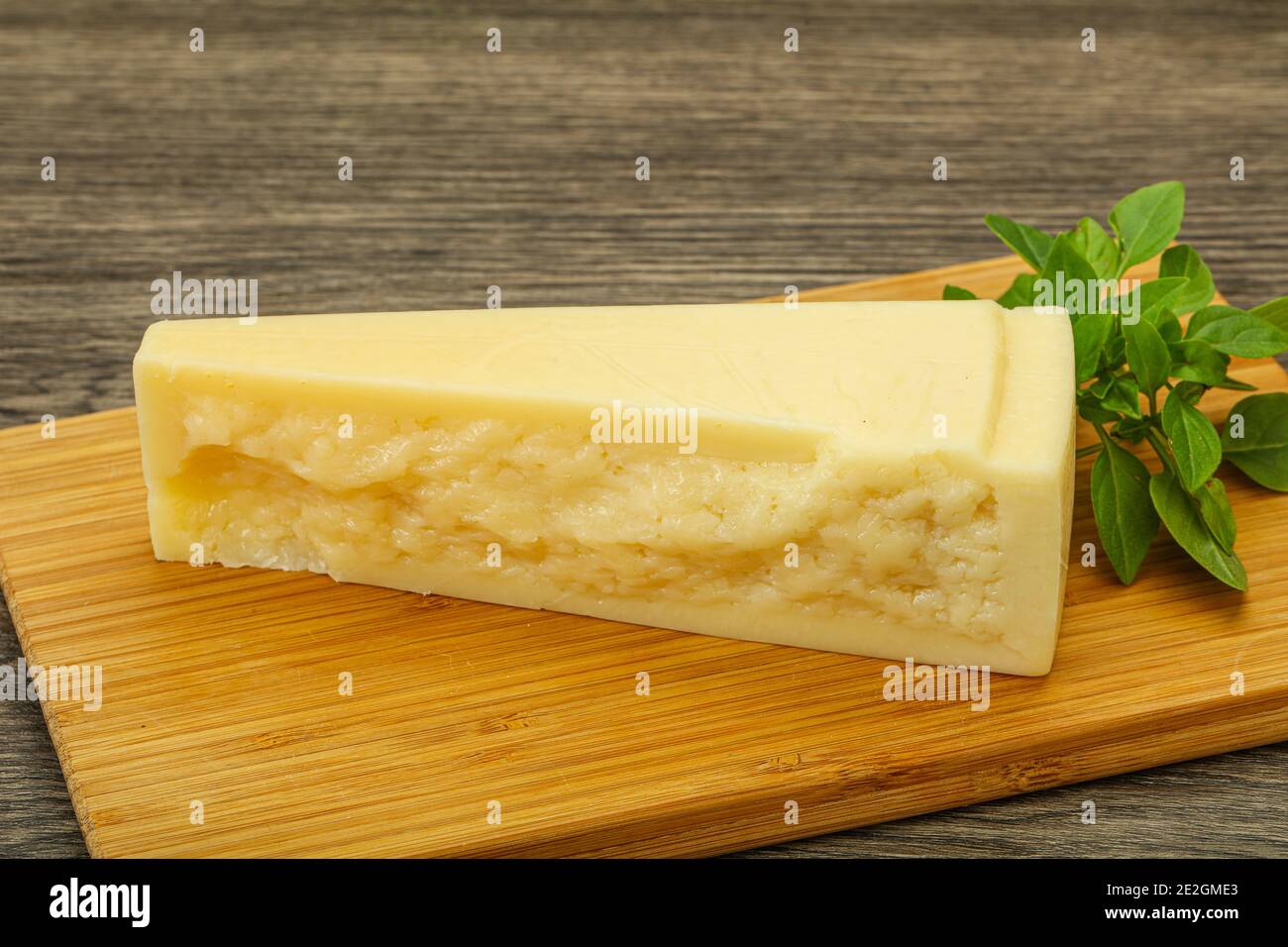 Hard parmesan cheese served basil leaves Stock Photo - Alamy