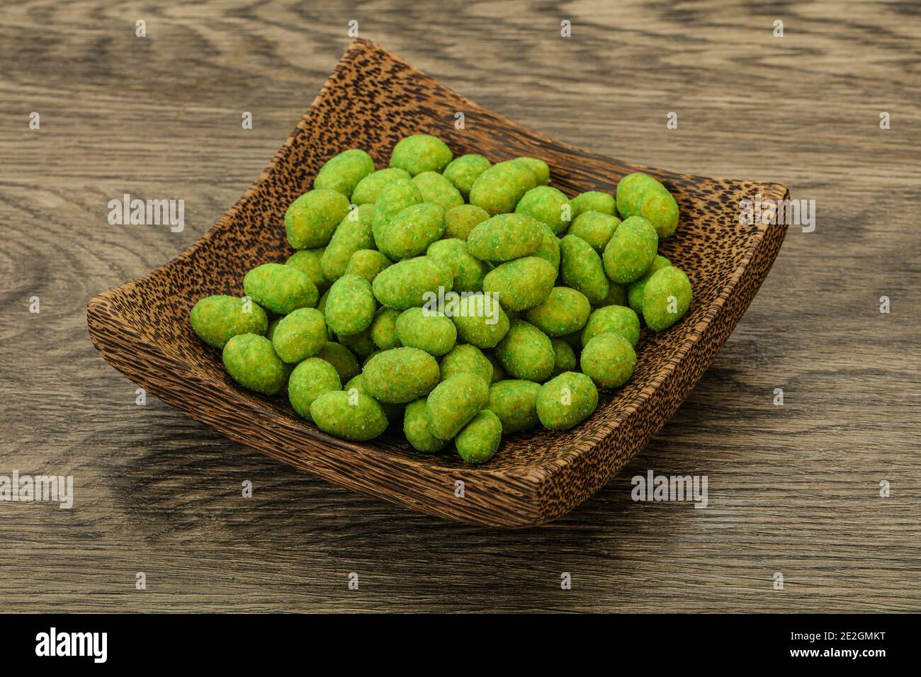 Spicy wasabi peanuts snack in the bowl Stock Photo - Alamy