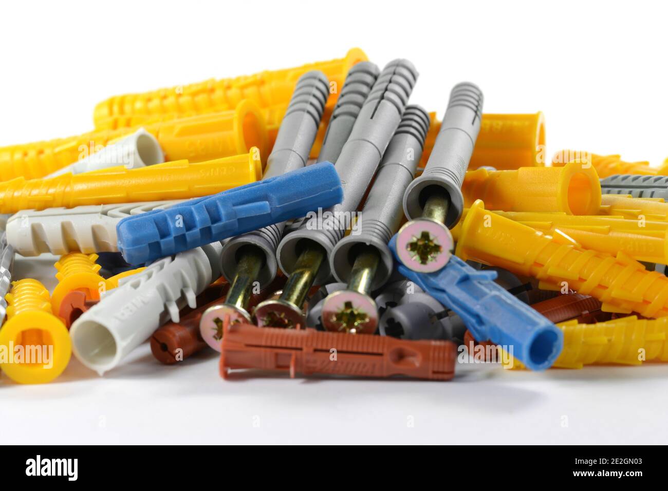 Wall plug - also known as screw anchor or dowel, in different colors ...