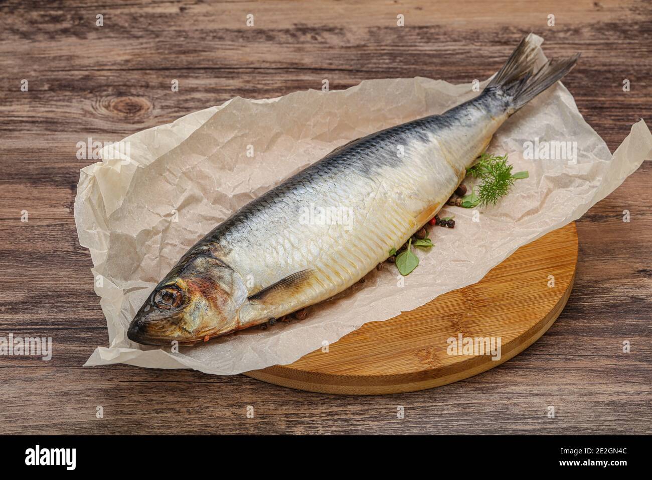 Salted Herring fish with pepper and spices Stock Photo - Alamy
