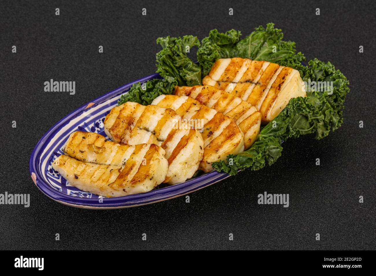 Grilled Greek haloumi cheese with herbs and spices Stock Photo - Alamy