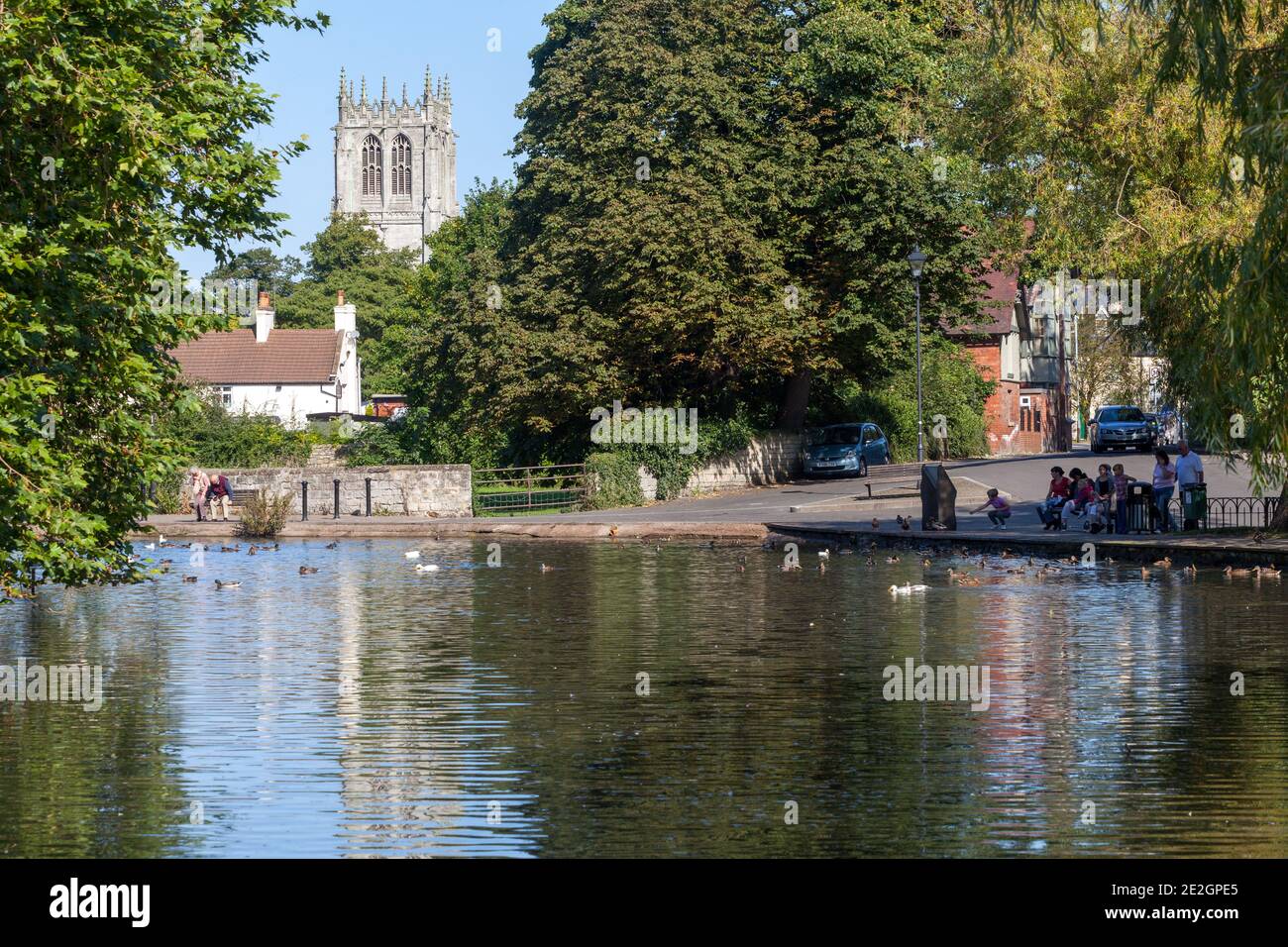 Summer view across the mill pond in Tickhill, South Yorkshire with the ...