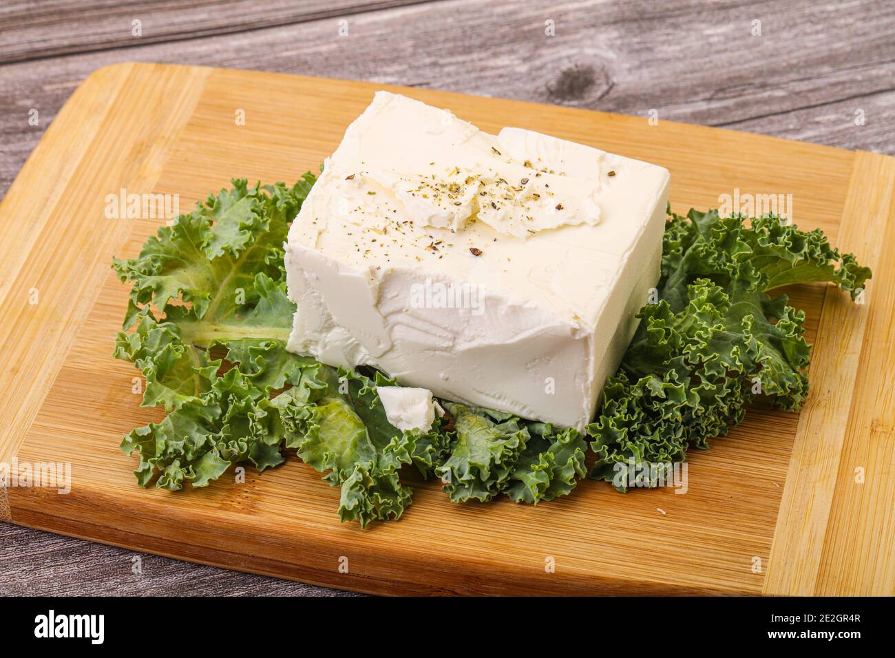 Traditional tasty Greek Feta soft cheese brick Stock Photo - Alamy