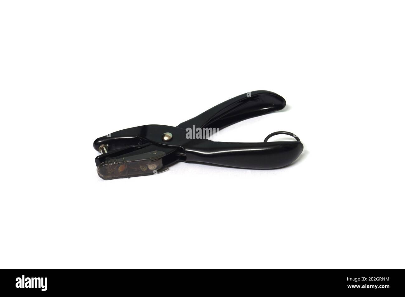 Paper punch in a white background Stock Photo - Alamy