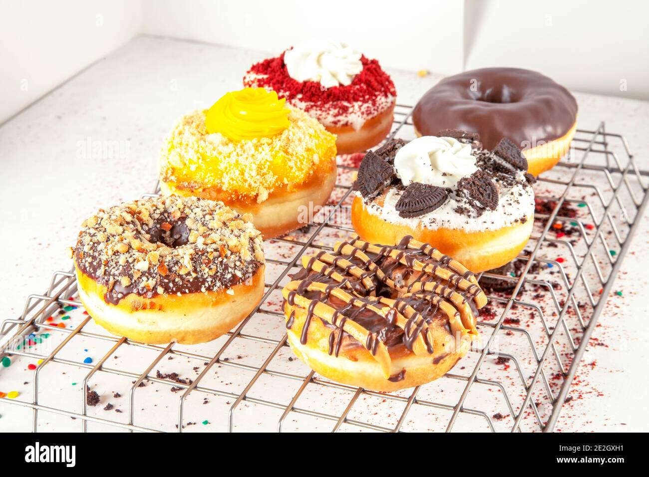 Assorted gourmet brioche doughnuts freshly made baked Stock Photo - Alamy
