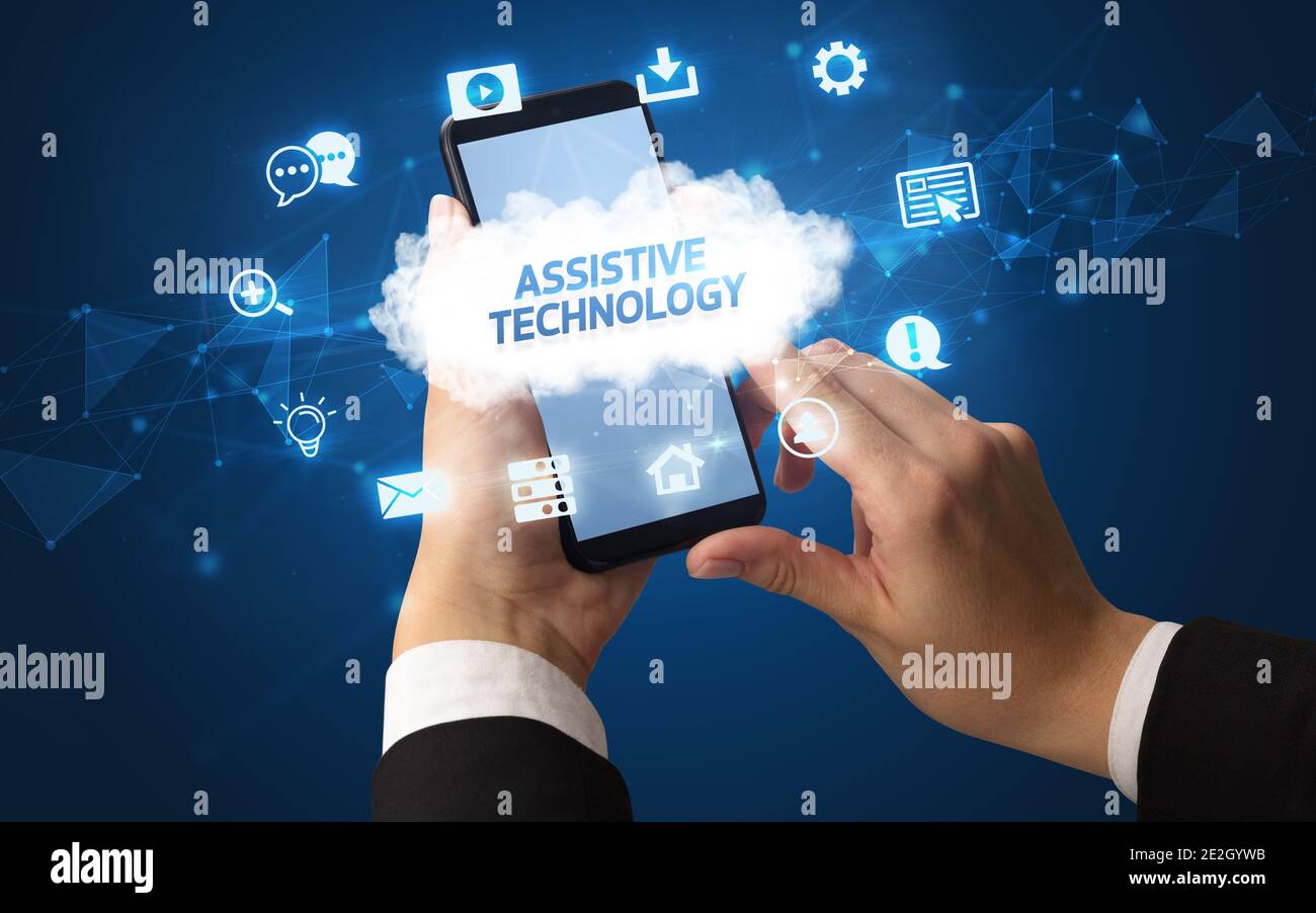Female hand holding smartphone with ASSISTIVE TECHNOLOGY inscription ...
