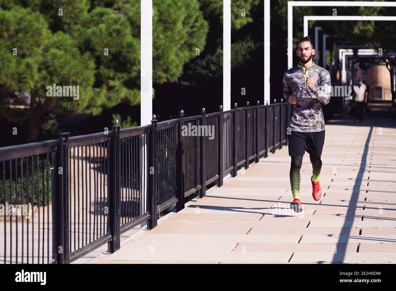 Handsome sportsman running around hi-res stock photography and images ...