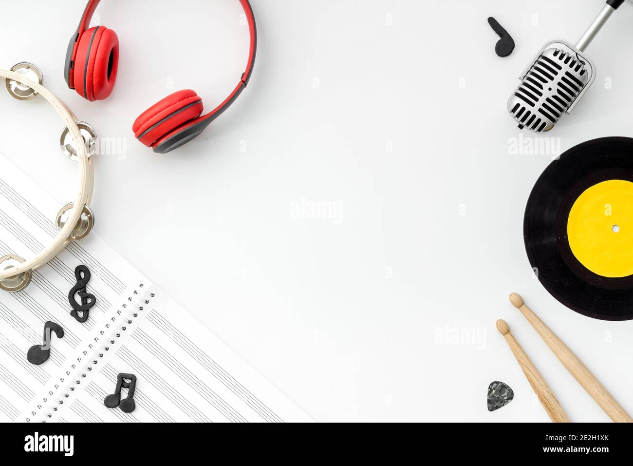 Frame of of music background - instrument with sheet music, top view ...