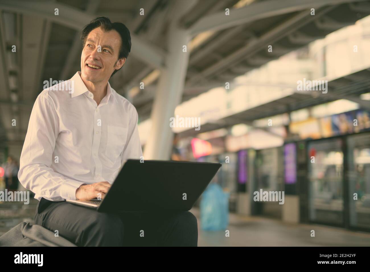 Mature handsome businessman exploring hi-res stock photography and ...