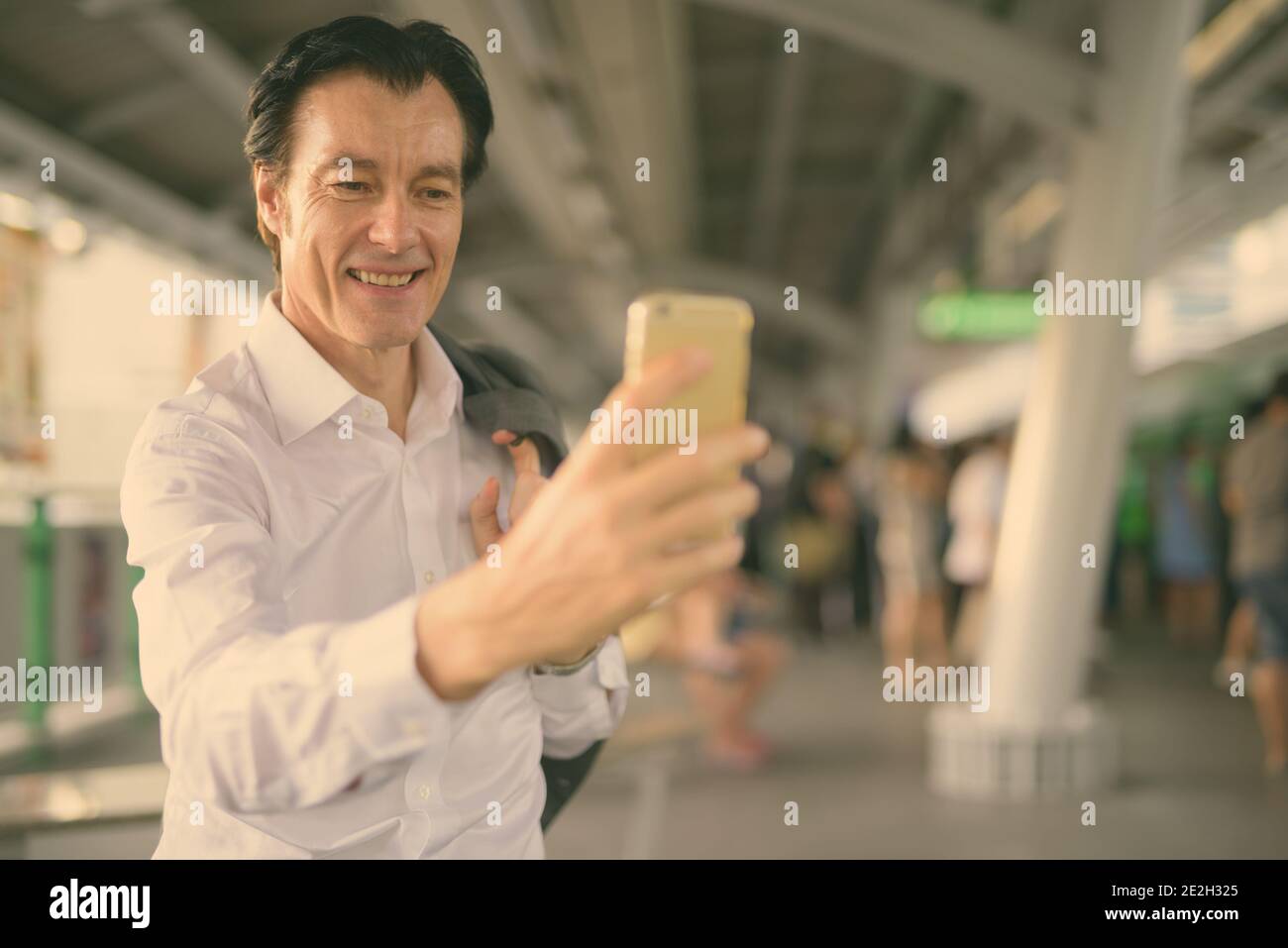 Mature handsome businessman exploring hi-res stock photography and ...