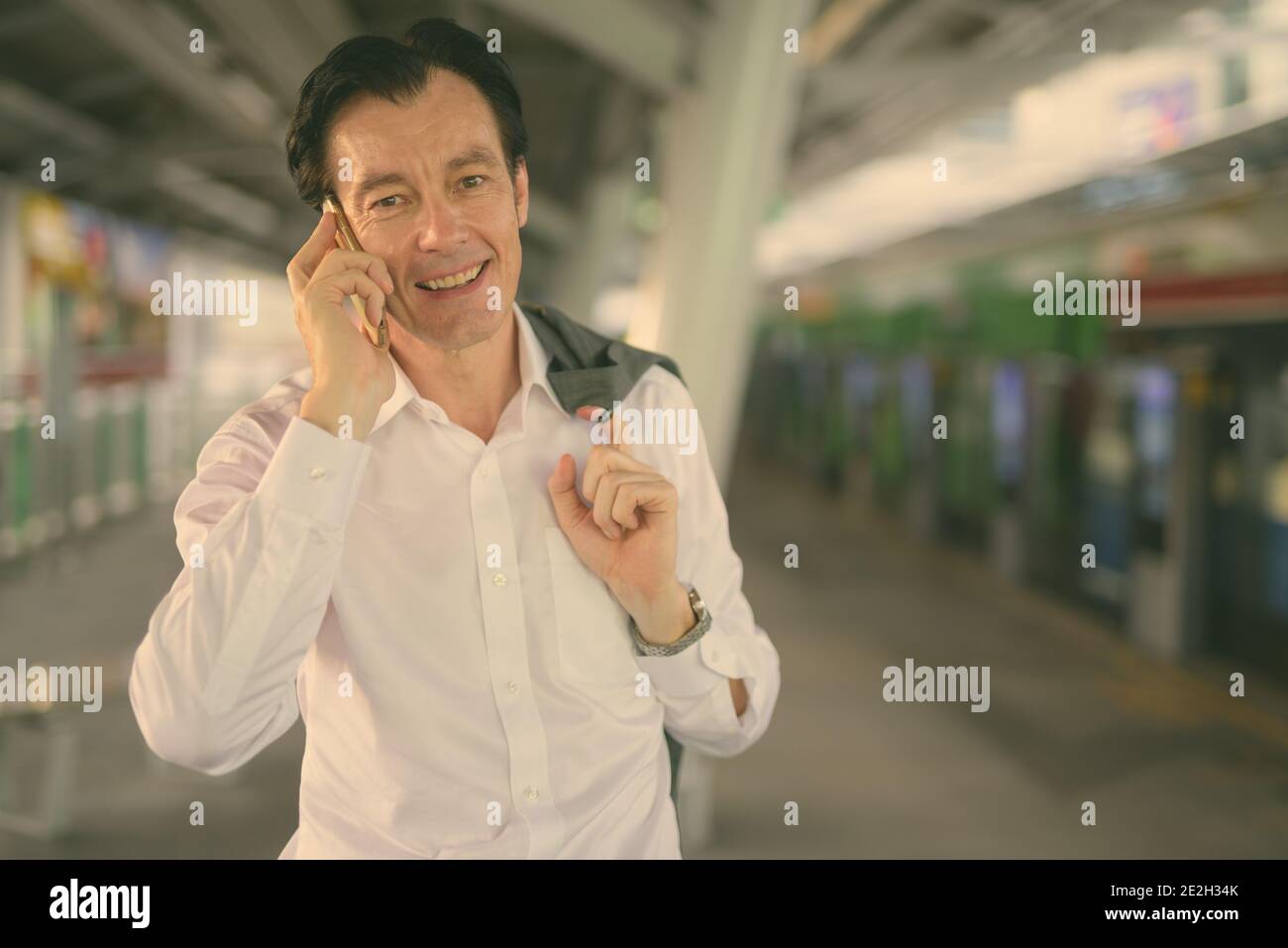 Mature handsome businessman exploring hi-res stock photography and ...