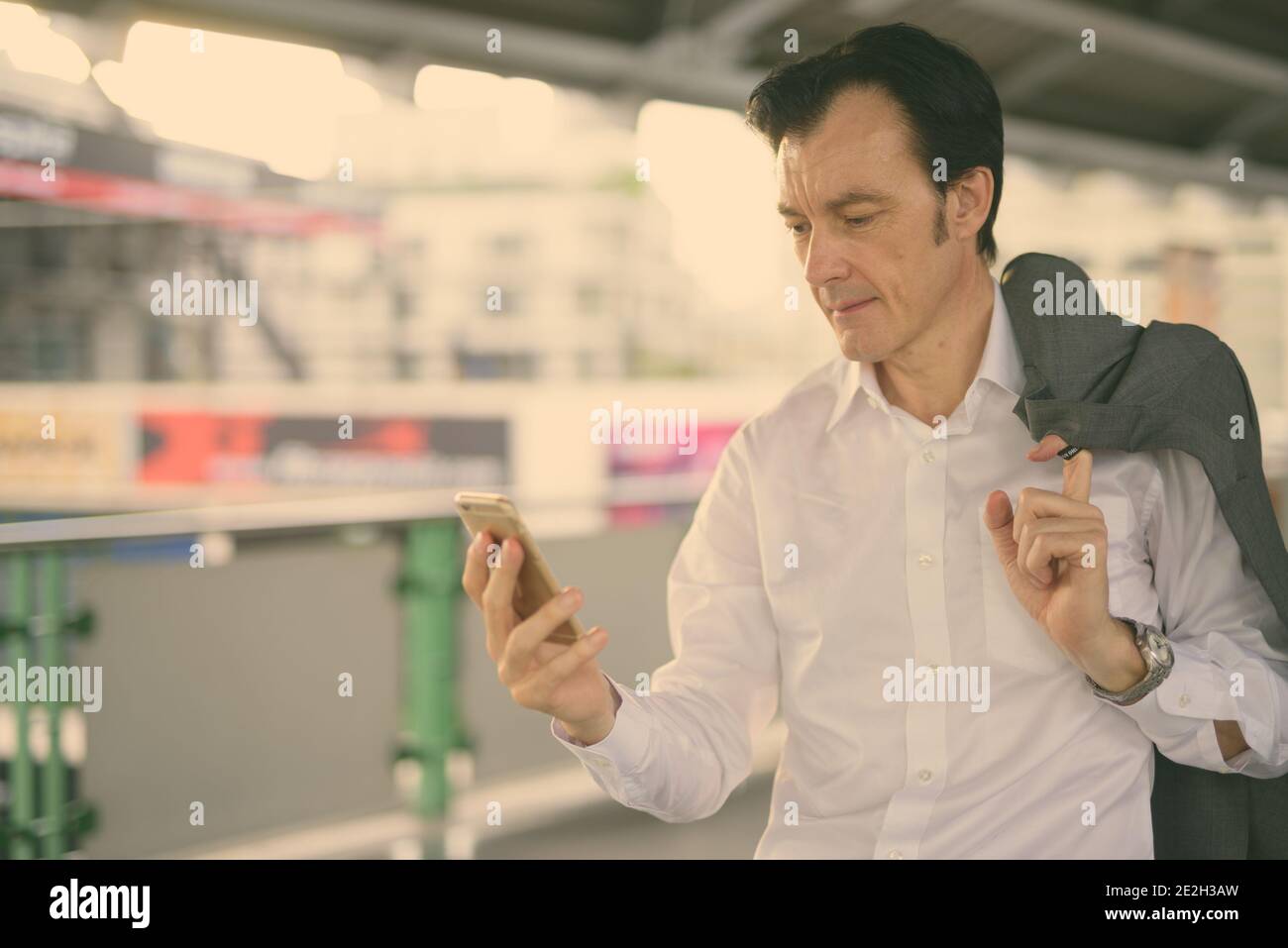 Mature handsome businessman exploring hi-res stock photography and ...