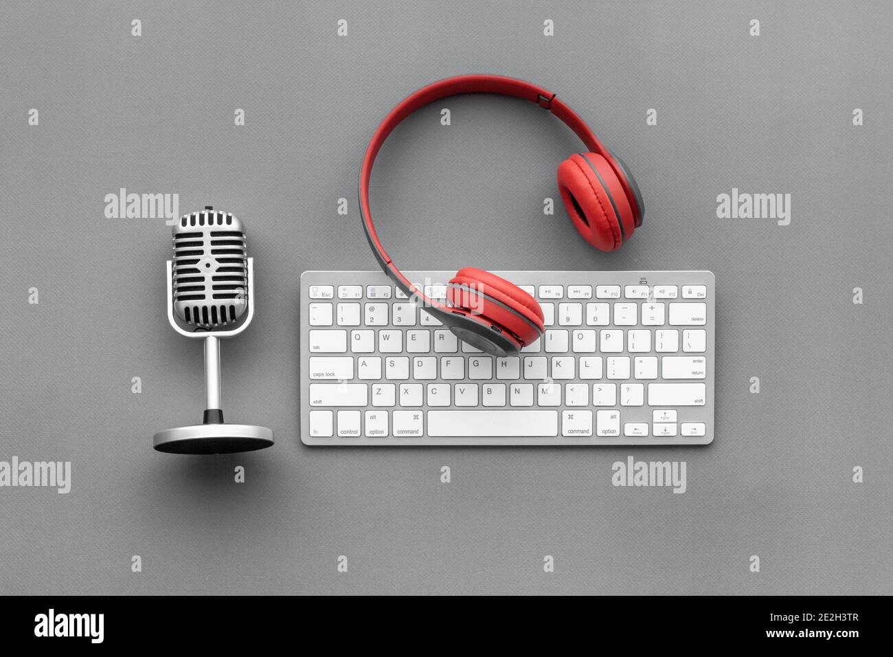 Audio equipment background. Retro microphone and headphones on studio ...