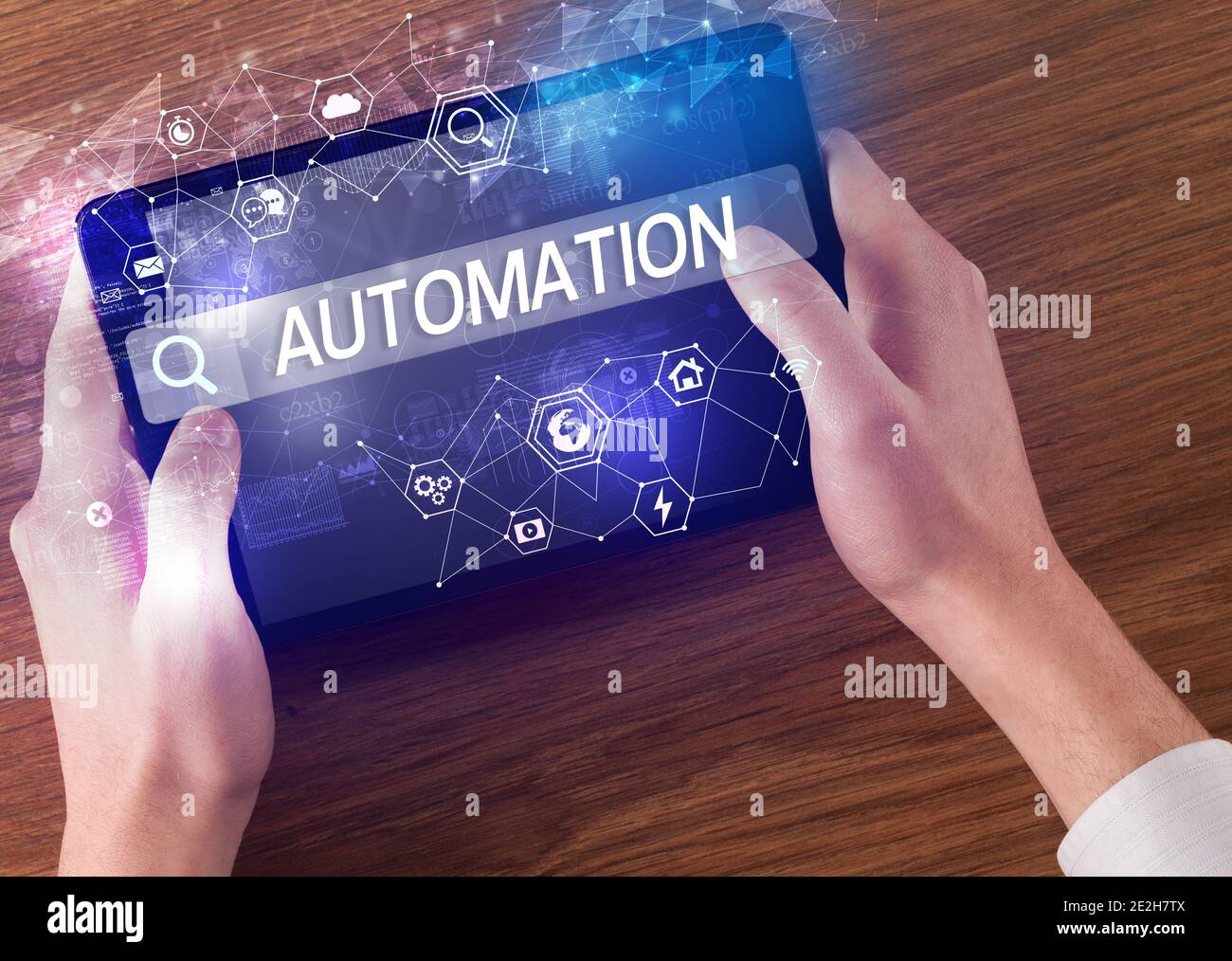 Close-up of a tablet searching AUTOMATION inscription, hi-tech ...